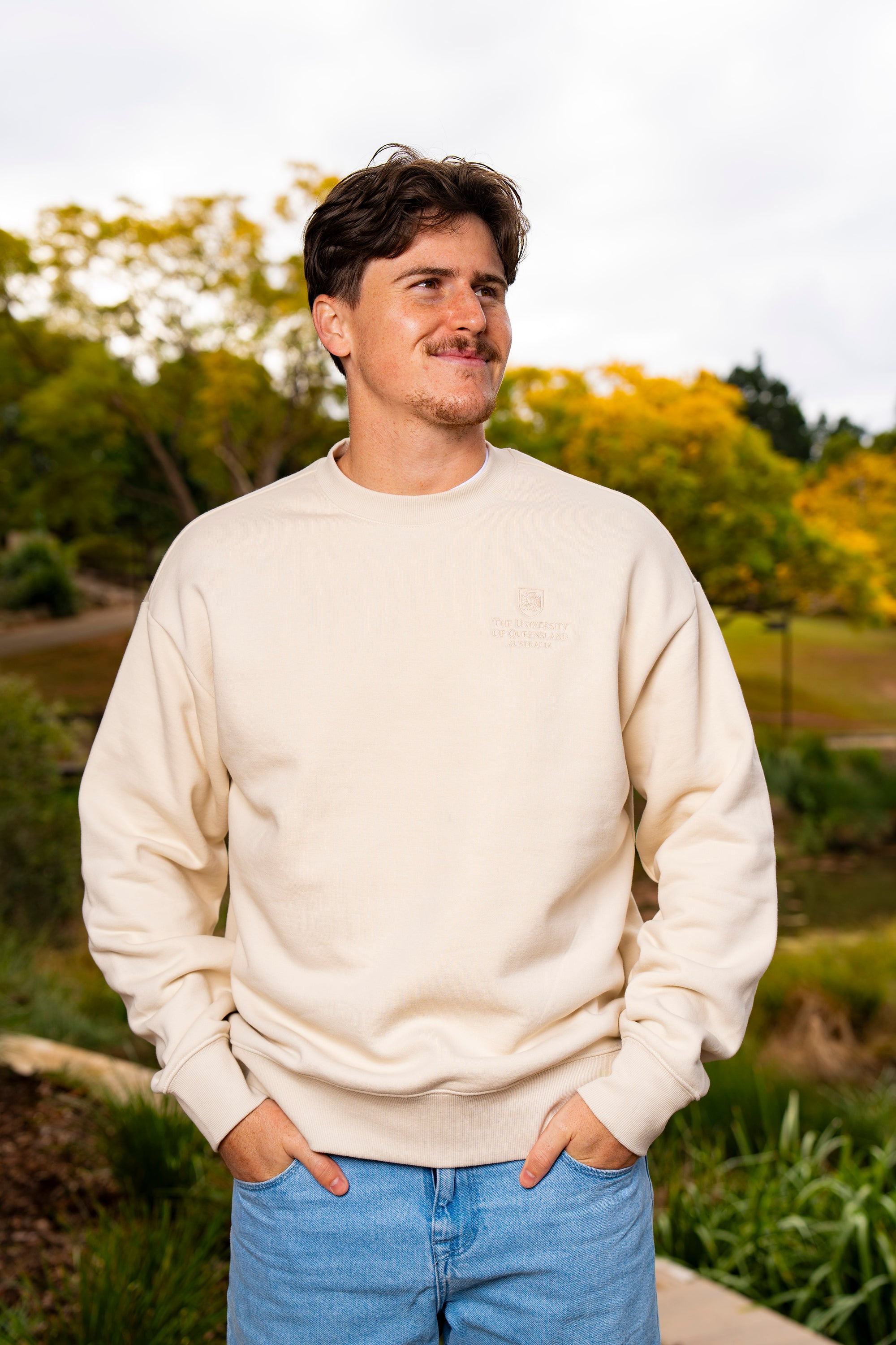 UQ Shield Embroidered Sweater - Ecru – UQ Shop